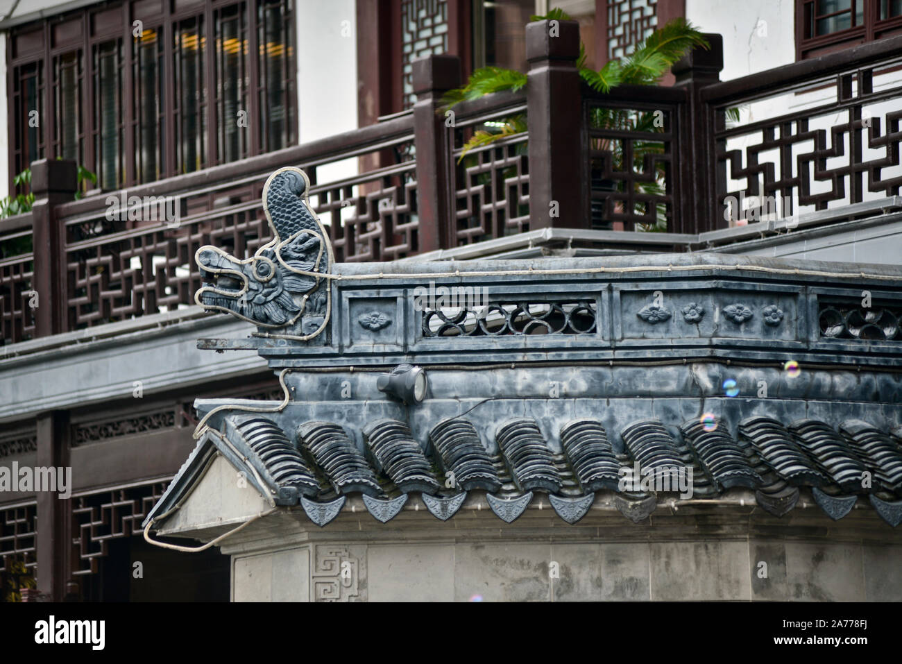 City God Temple of Shanghai (China). Detail of the paifang in the main entrance gate Stock Photo ...