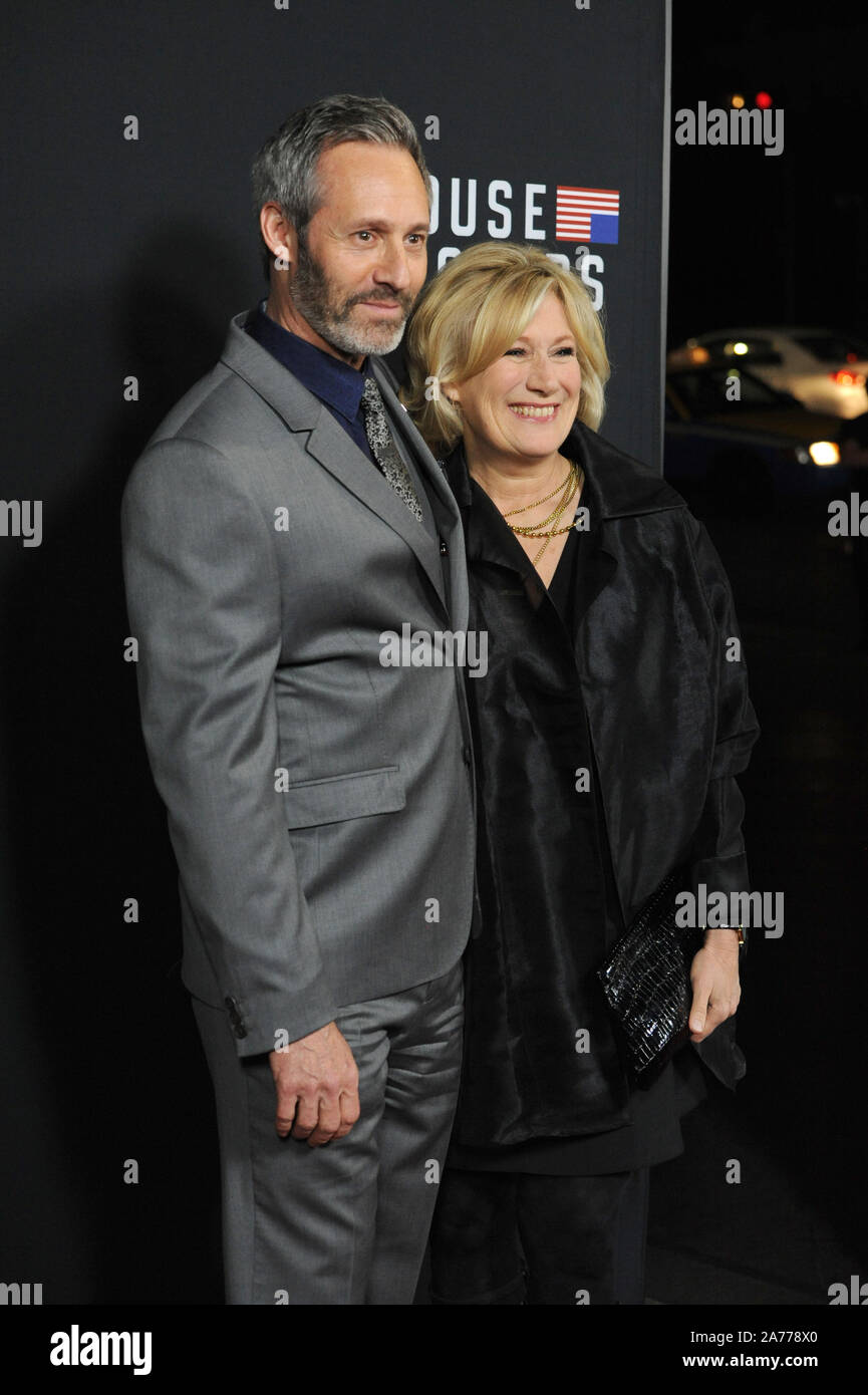 LOS ANGELES, CA - FEBRUARY 13, 2014: Michel Gill & wife Jayne Atkinson ...