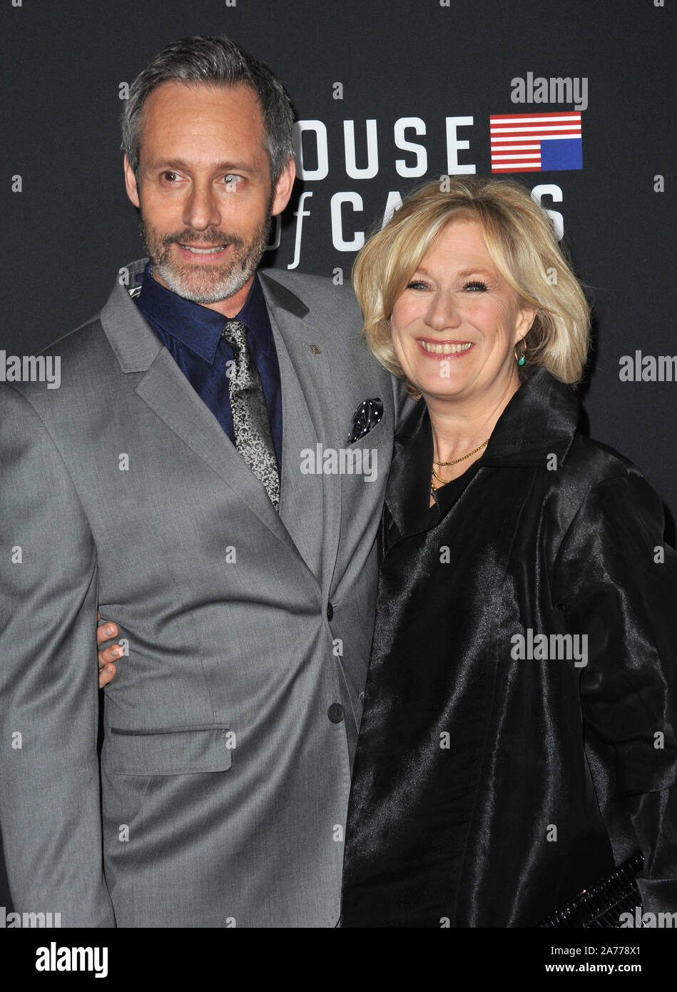 LOS ANGELES, CA - FEBRUARY 13, 2014: Michel Gill & wife Jayne Atkinson ...