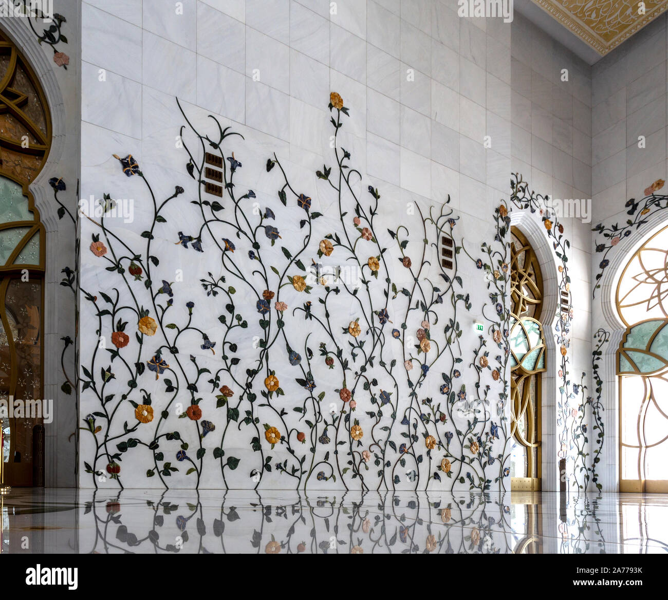 The interior walls decorated with intricate floral inlays of the Sheikh ...