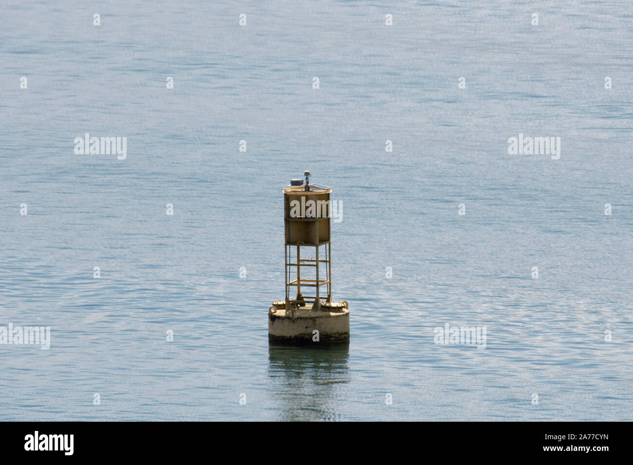 Floating buoy as a signal for passing ships Stock Photo - Alamy