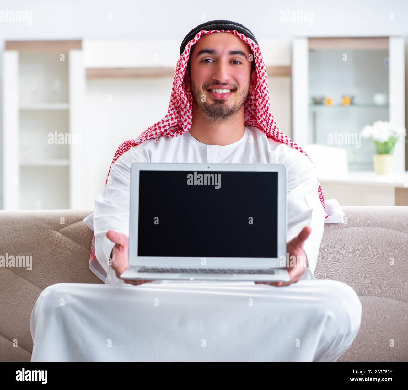 The arab man working at home on his work Stock Photo - Alamy