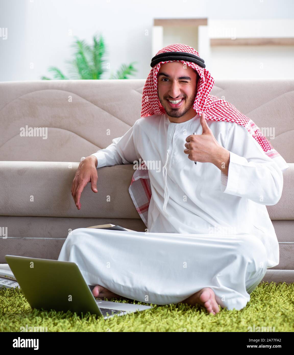 The arab man working at home on his work Stock Photo - Alamy