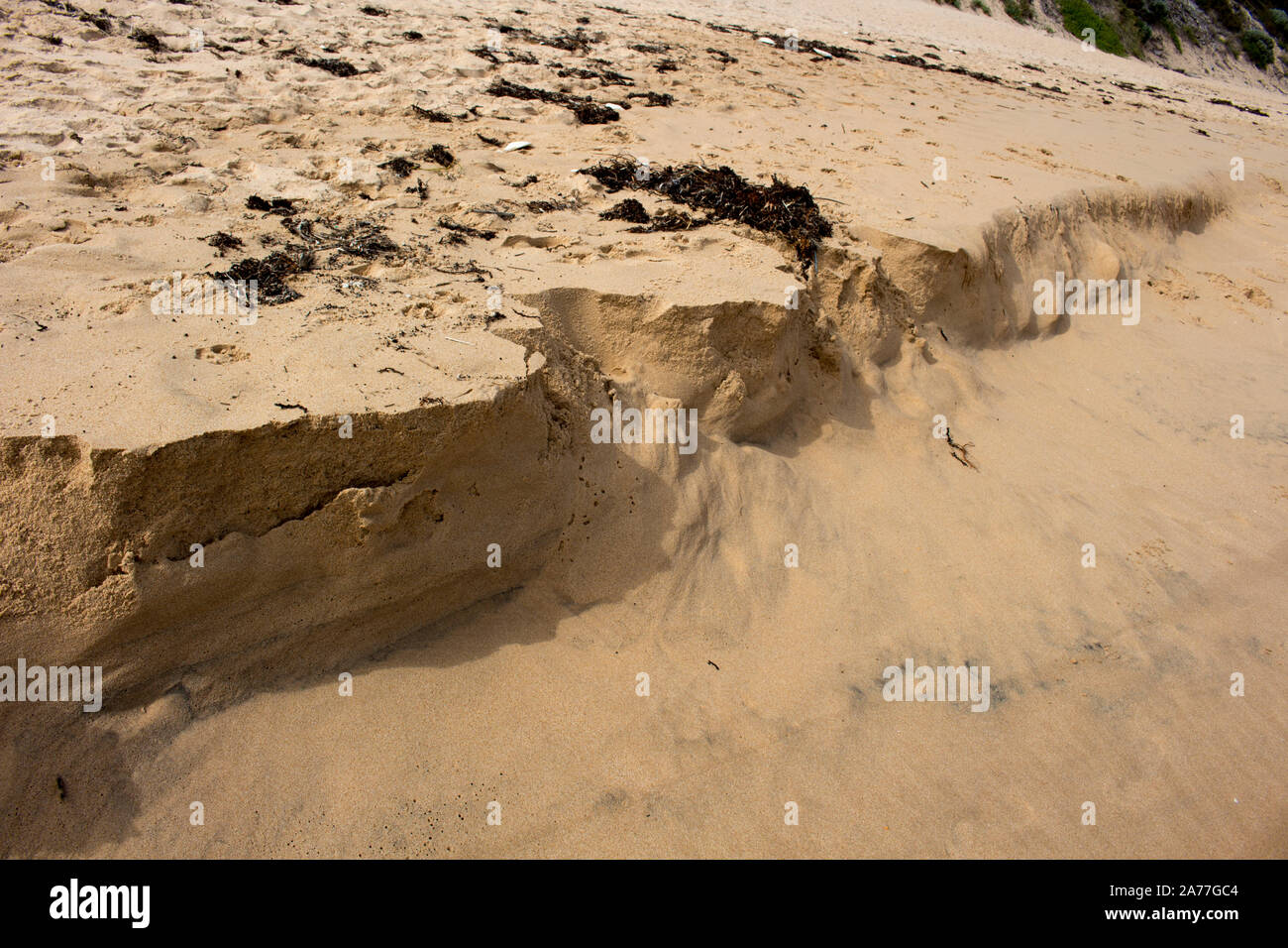 Sand patterns formations where Indian Ocean waves are lapping the sandy ...