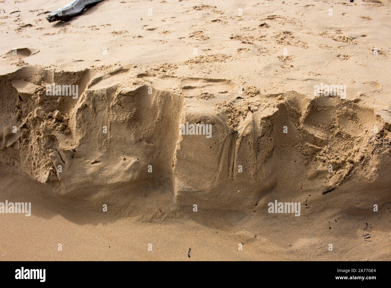 Sand patterns formations where Indian Ocean waves are lapping the sandy ...