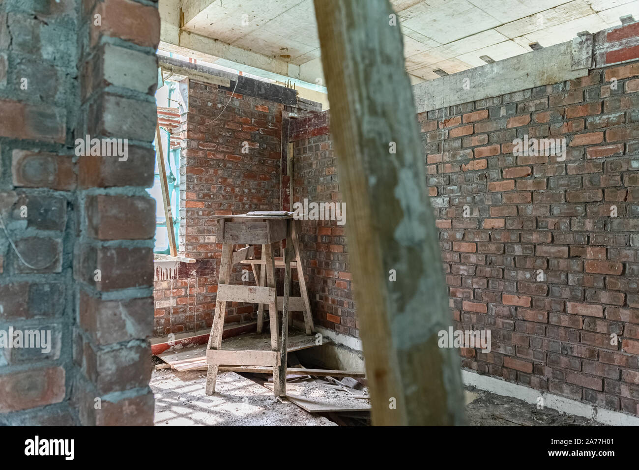 inside of an unfinished building with protection scaffolding and ...