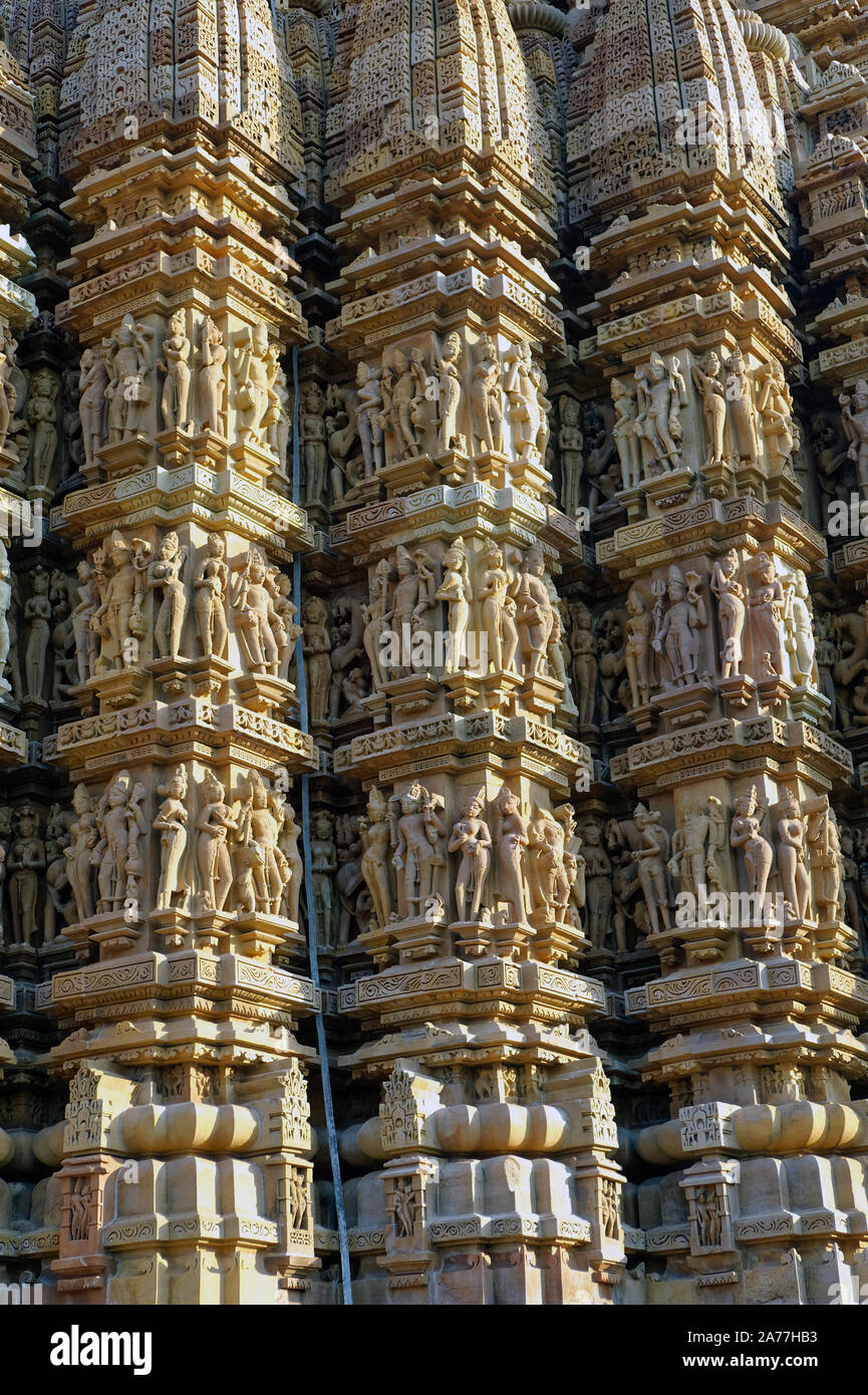Jangha or wall of Kandariya temple Stock Photo - Alamy