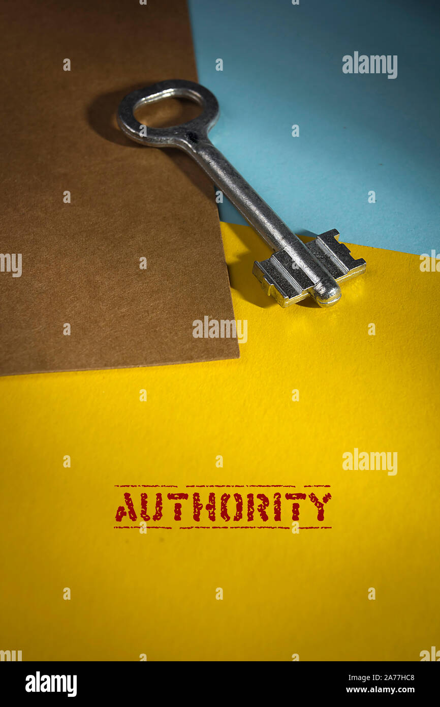 The poster with a key on Authority Stock Photo - Alamy