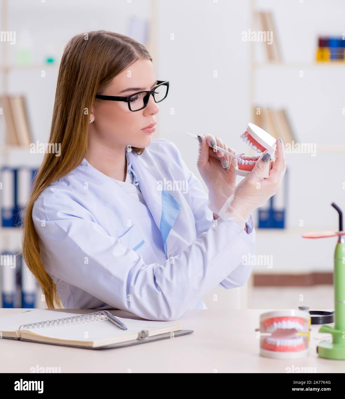 The dentistry student practicing skills in classroom Stock Photo - Alamy