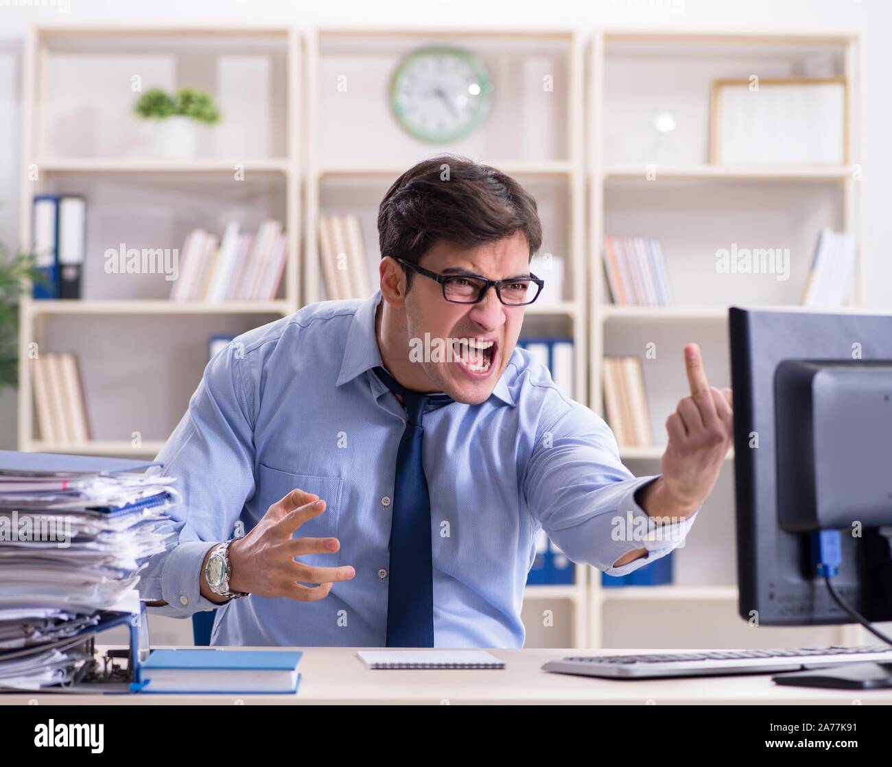 The tired businessman with too much paperwork Stock Photo - Alamy