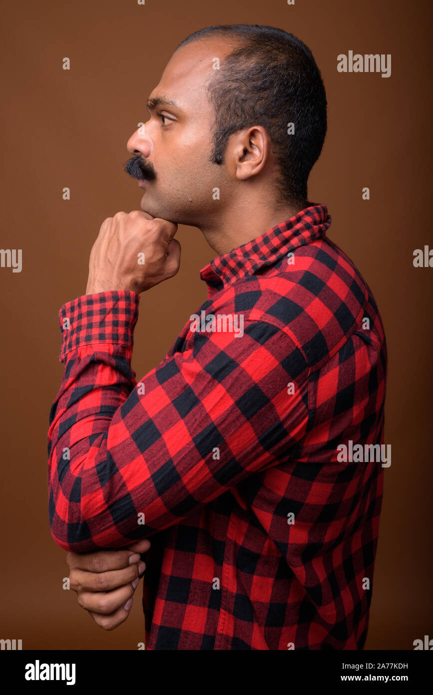 Side profile indian thoughtful man hi-res stock photography and images ...