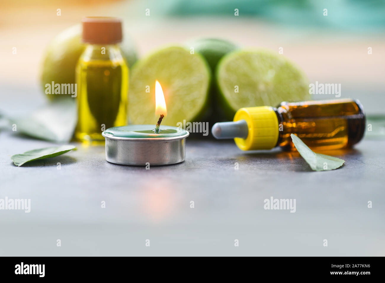 Aromatherapy herbal oil bottles aroma with lime lemon leaves herbal ...