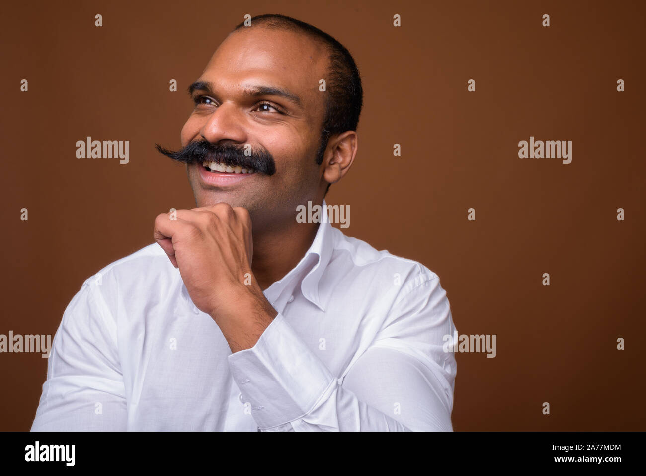 Face of happy Indian businessman with mustache in casual clothing Stock ...