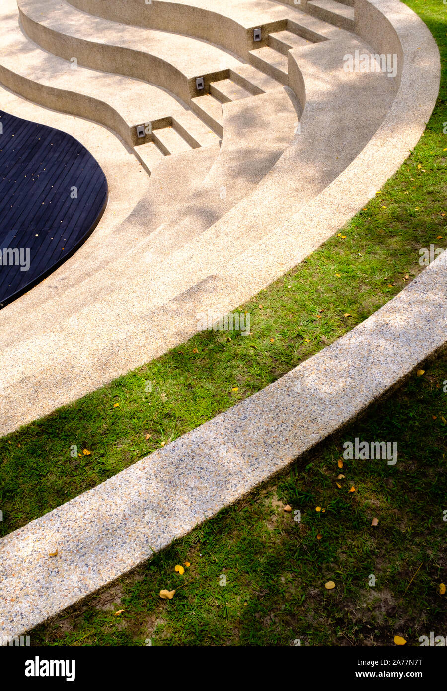 the steps of the outdoor grass seating in park Stock Photo - Alamy