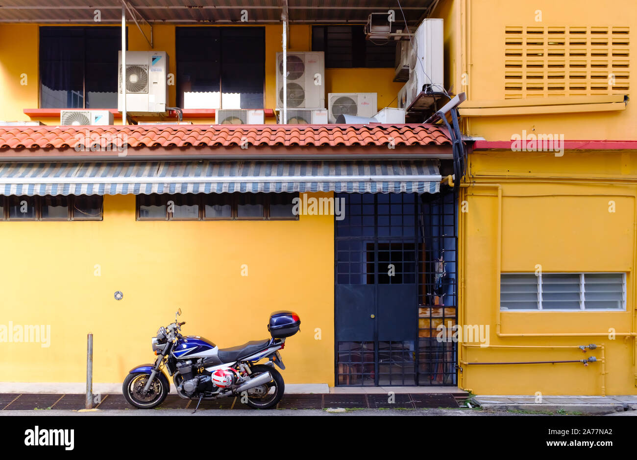 Singapore-24 MAR 2018: Motorcycle in front of a residential building in ...