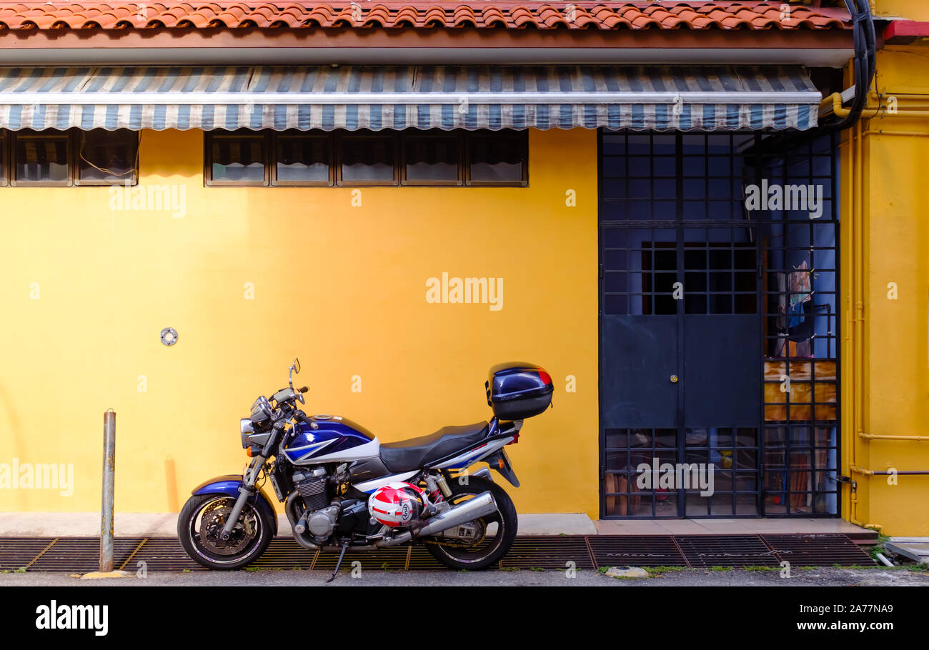 Singapore-24 MAR 2018: Motorcycle in front of a residential building in ...