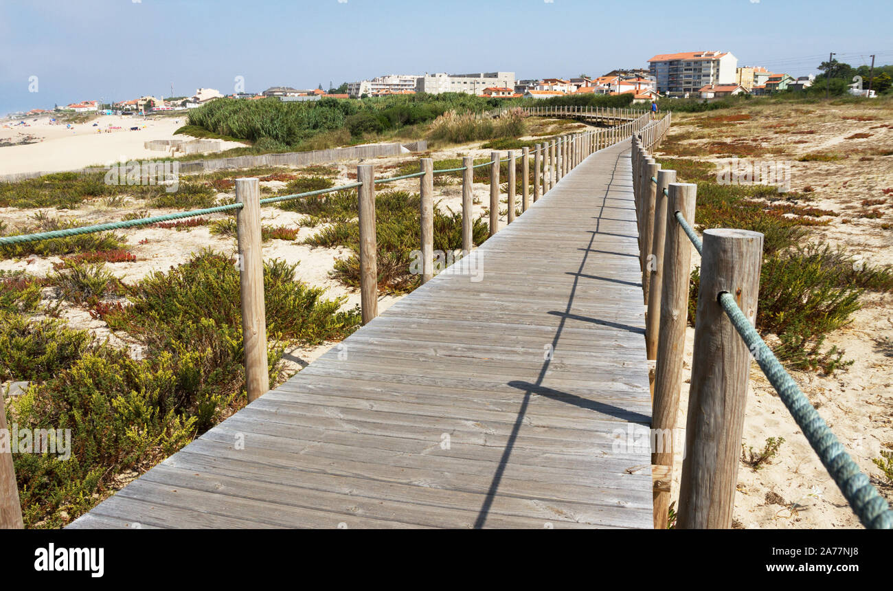 Wooden promenade at european sandy beach near sea Stock Photo - Alamy