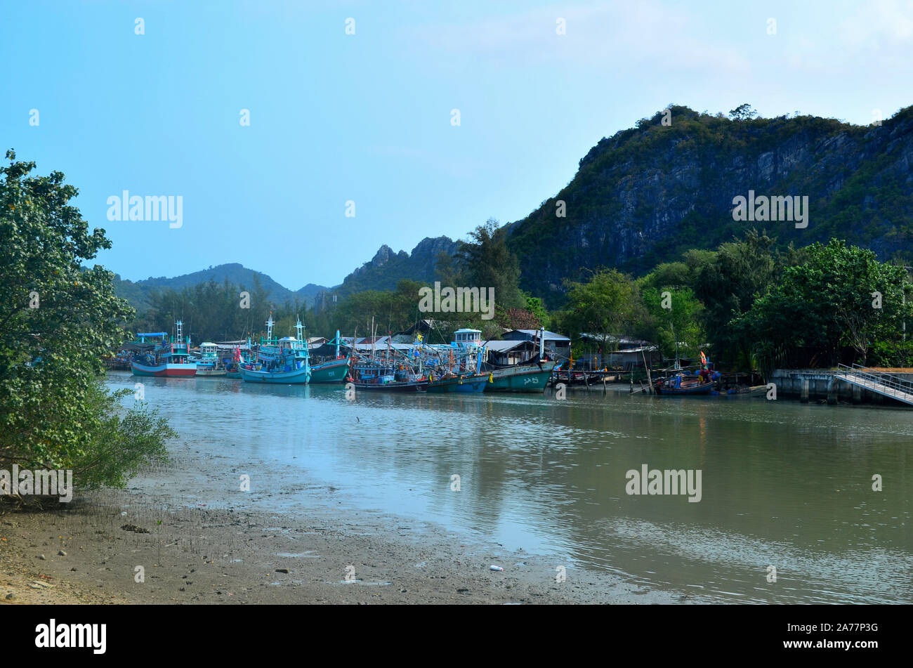Fishing boats lined up in the Klong at Sam Roi Yot Prachuap Khiri Khan ...