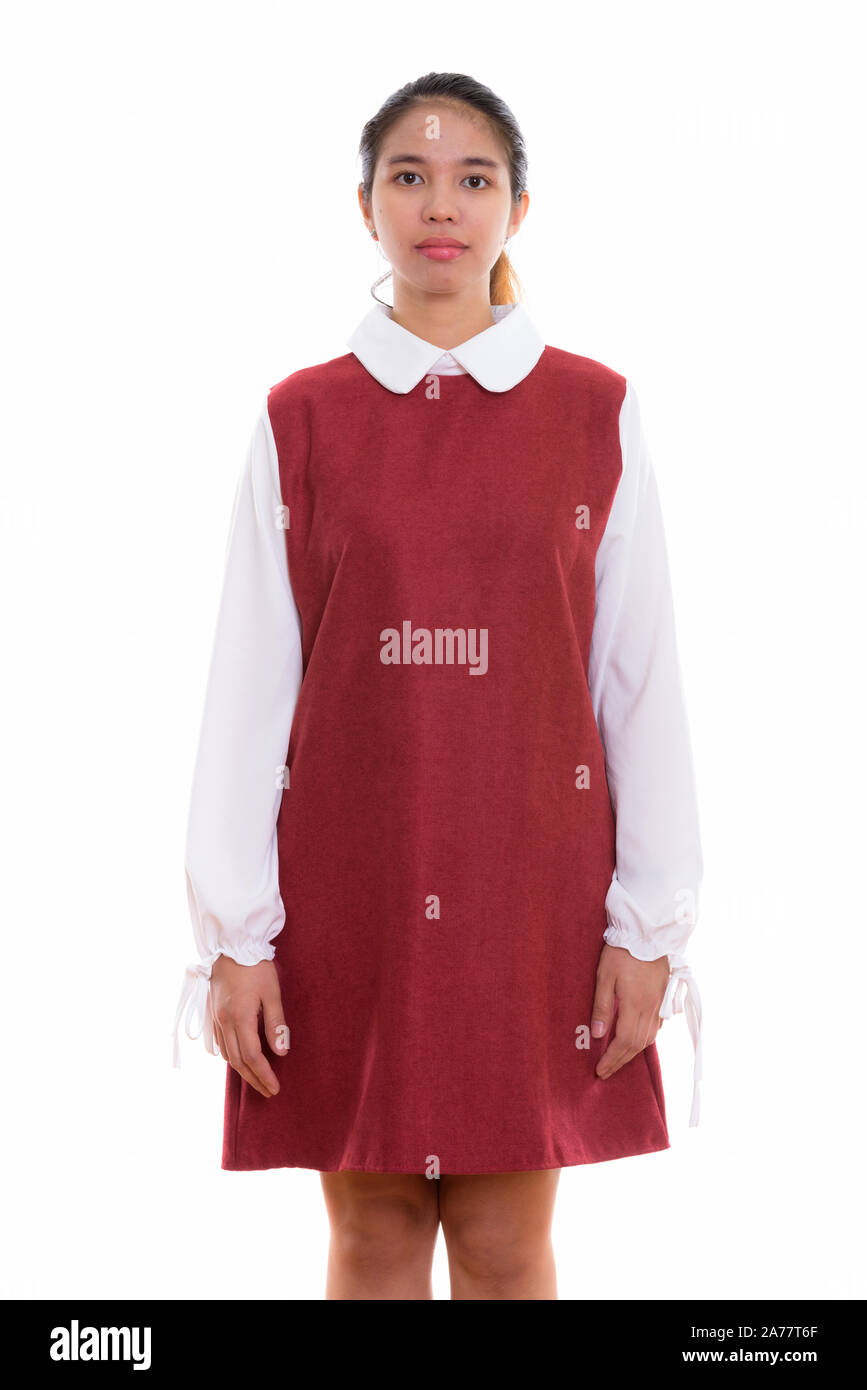 Studio shot of young Asian woman standing Stock Photo - Alamy