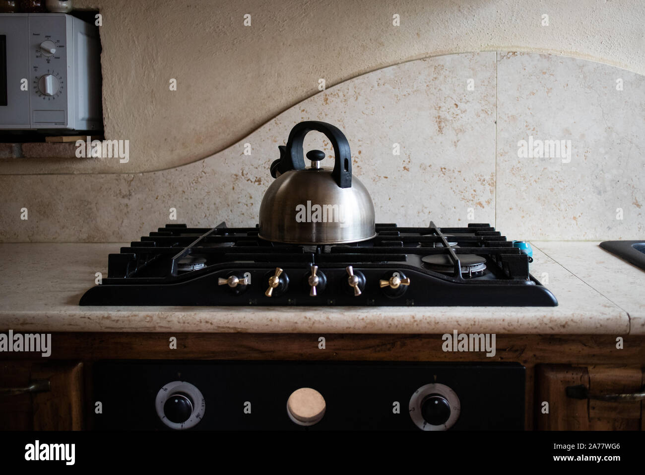 Old boiling coffee machine pot on a domestic kitchen Stock Photo - Alamy