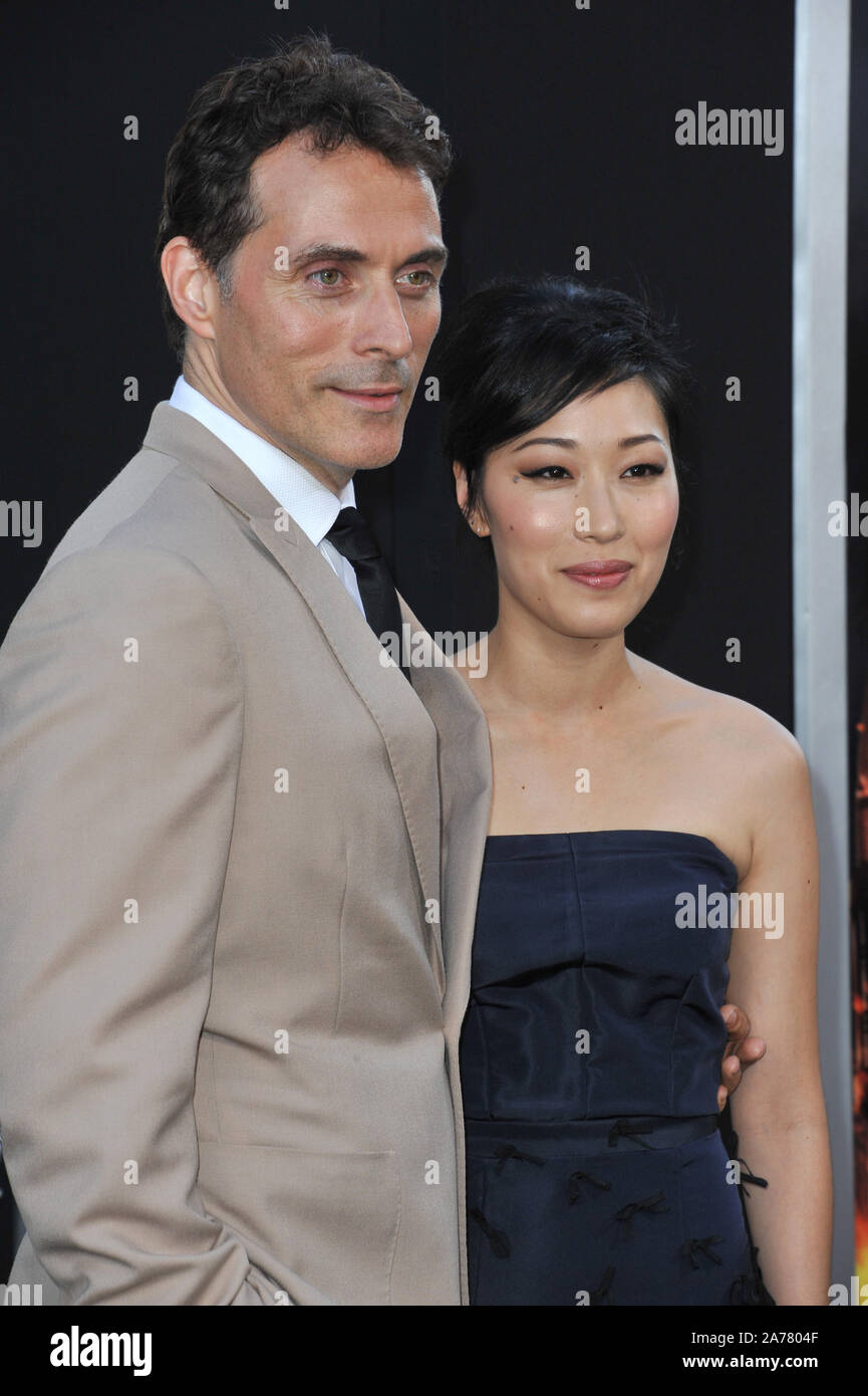 LOS ANGELES, CA - JULY 23, 2014: Rufus Sewell & girlfriend Ami Komai at the premiere of his ...