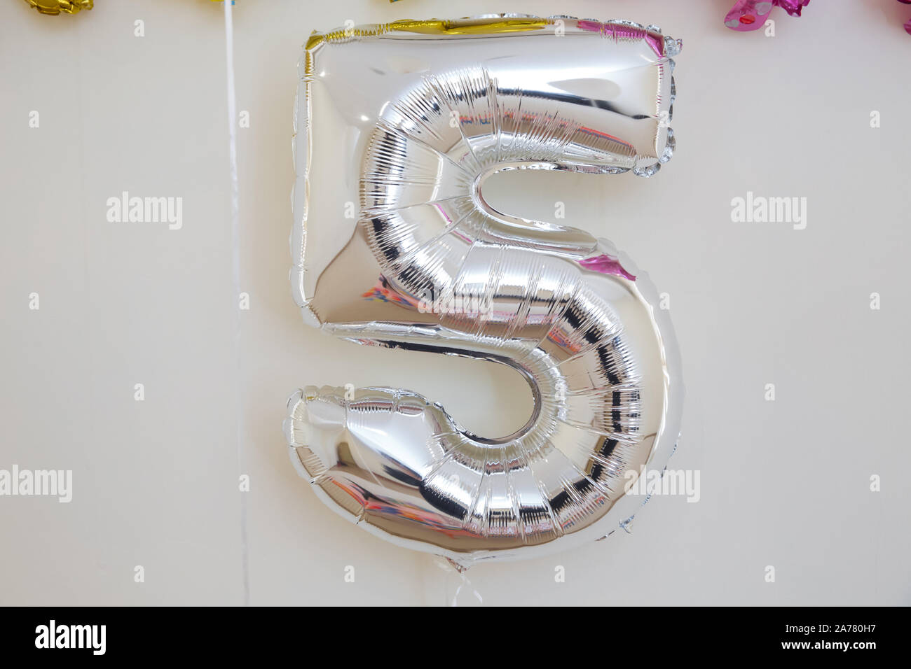 One of full number set .Chrome number 5 made of inflatable balloon ...