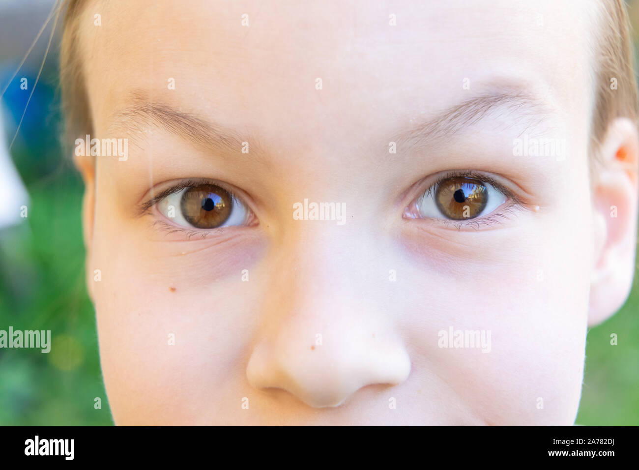 Close-up of a face of 10 year old girl Stock Photo - Alamy
