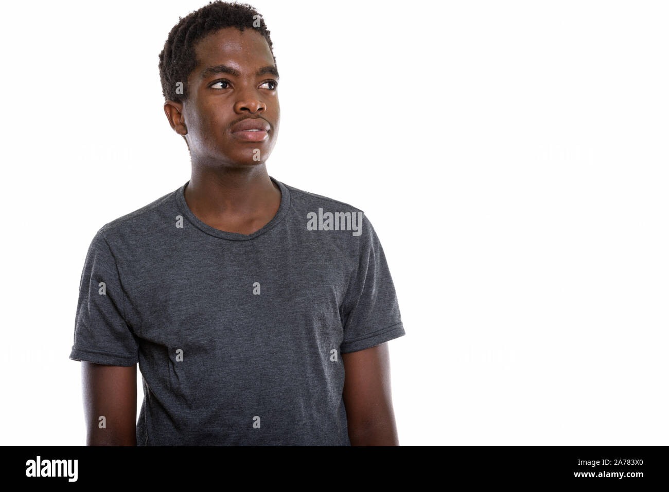 Studio shot of young African teenage boy with Afro hair Stock Photo - Alamy