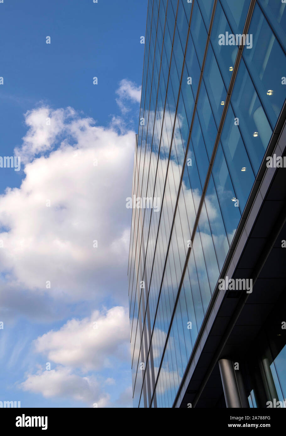 Clouds reflected in a building at More London Riverside on the ...