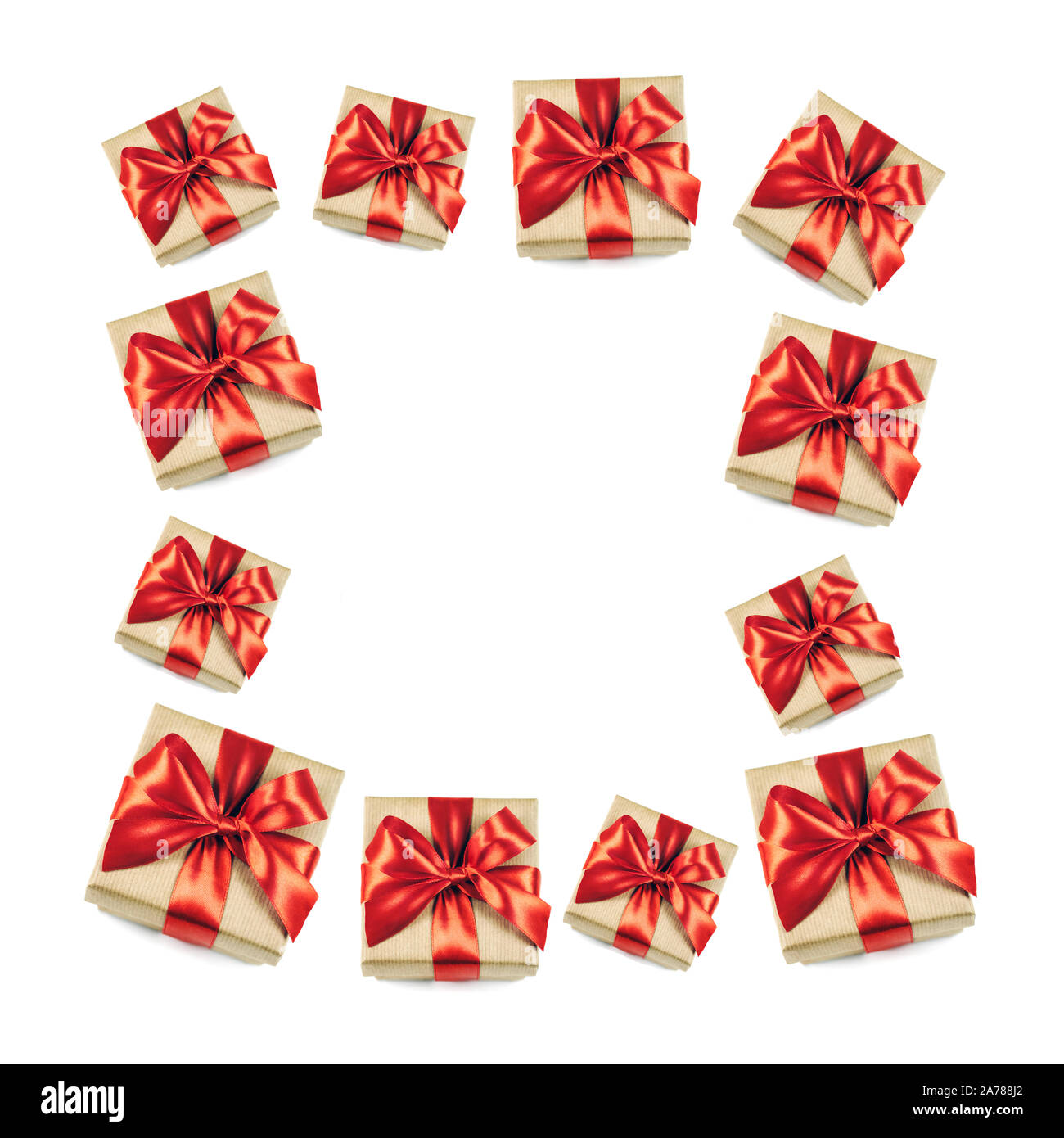 Frame of festive gift boxes with red ribbon bow isolated on white ...