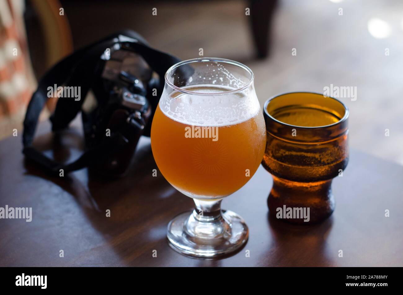 Beer and a camera Stock Photo - Alamy