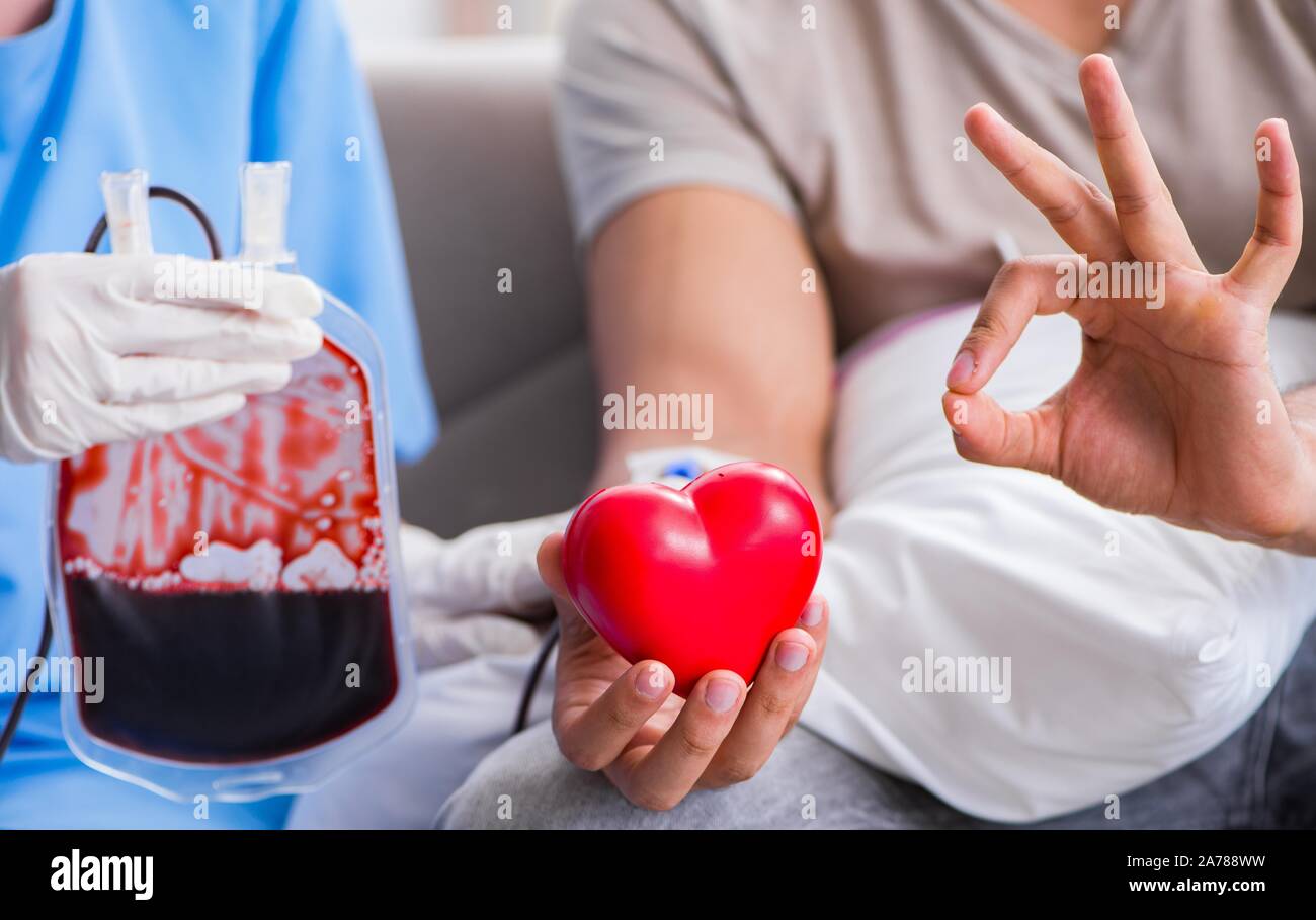 Patient getting blood transfusion hi-res stock photography and images ...