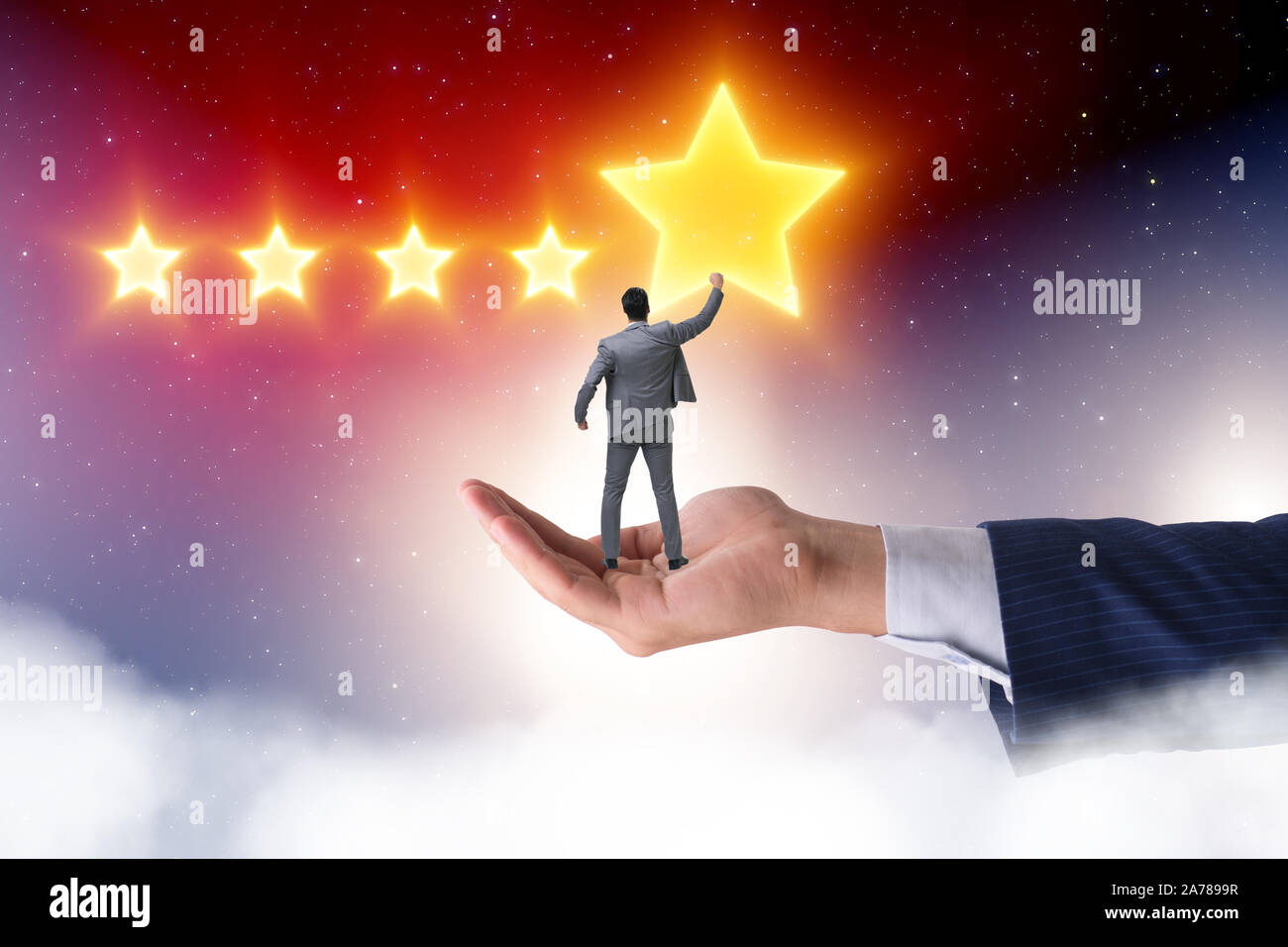 The businessman held on hand reaching out for stars Stock Photo - Alamy