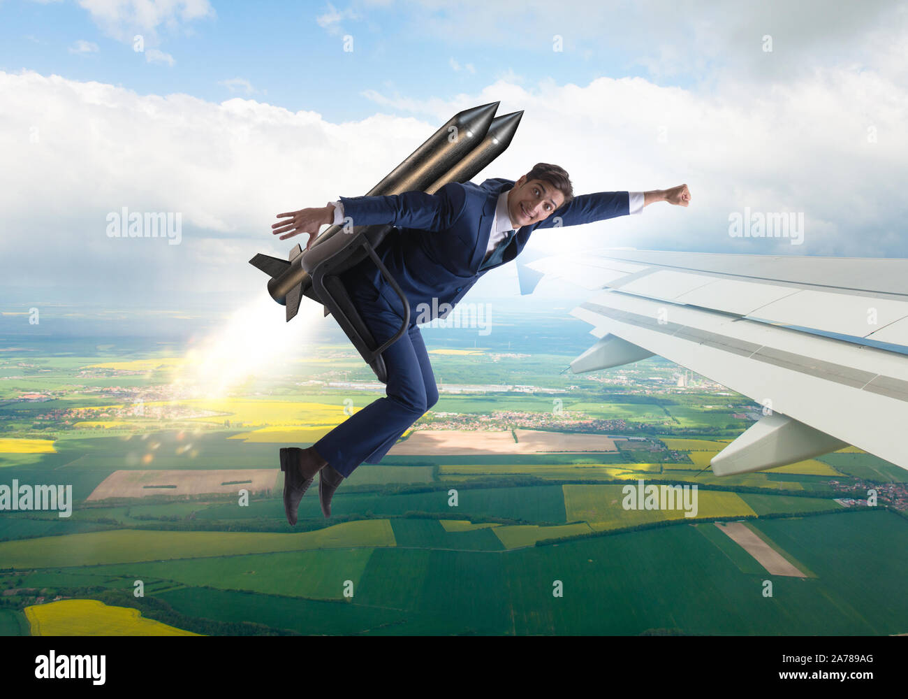 The businessman flying next to commercial flight Stock Photo - Alamy