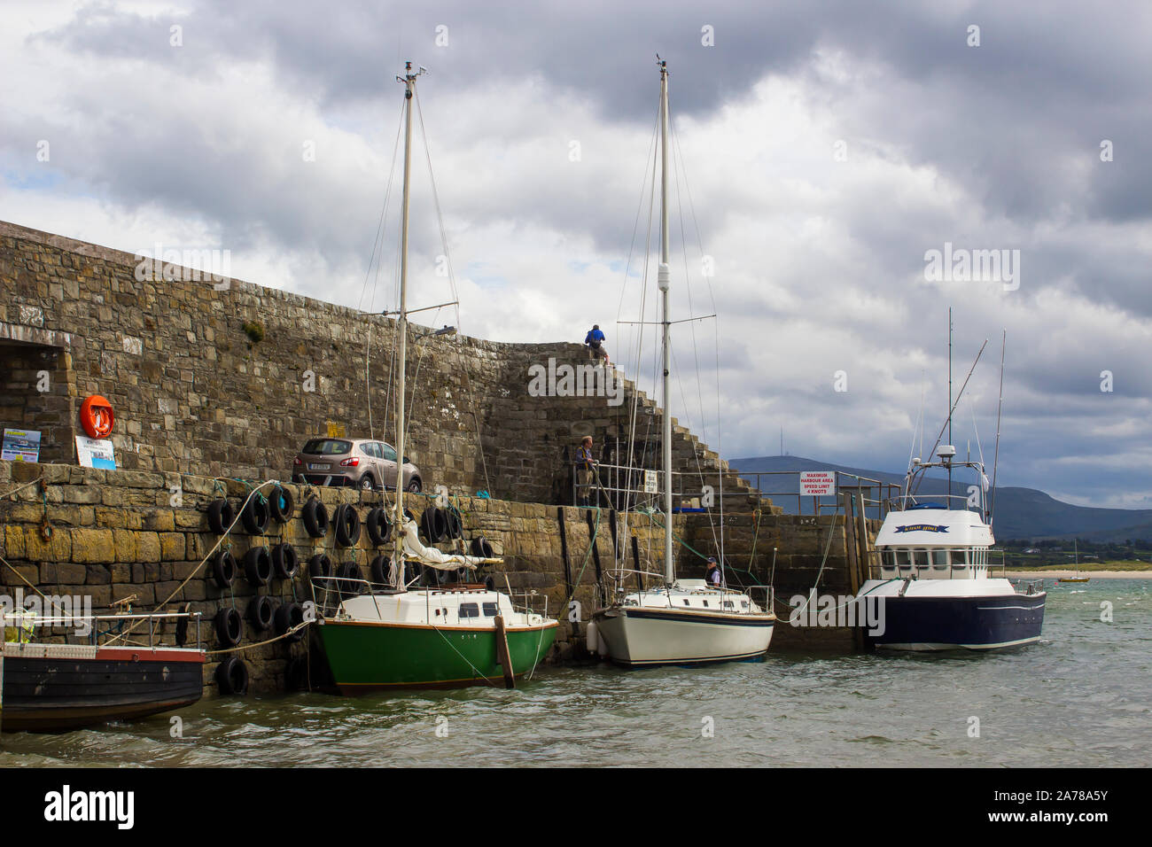 23 August 2019 Boats berthed in the classic stone harbour at ...