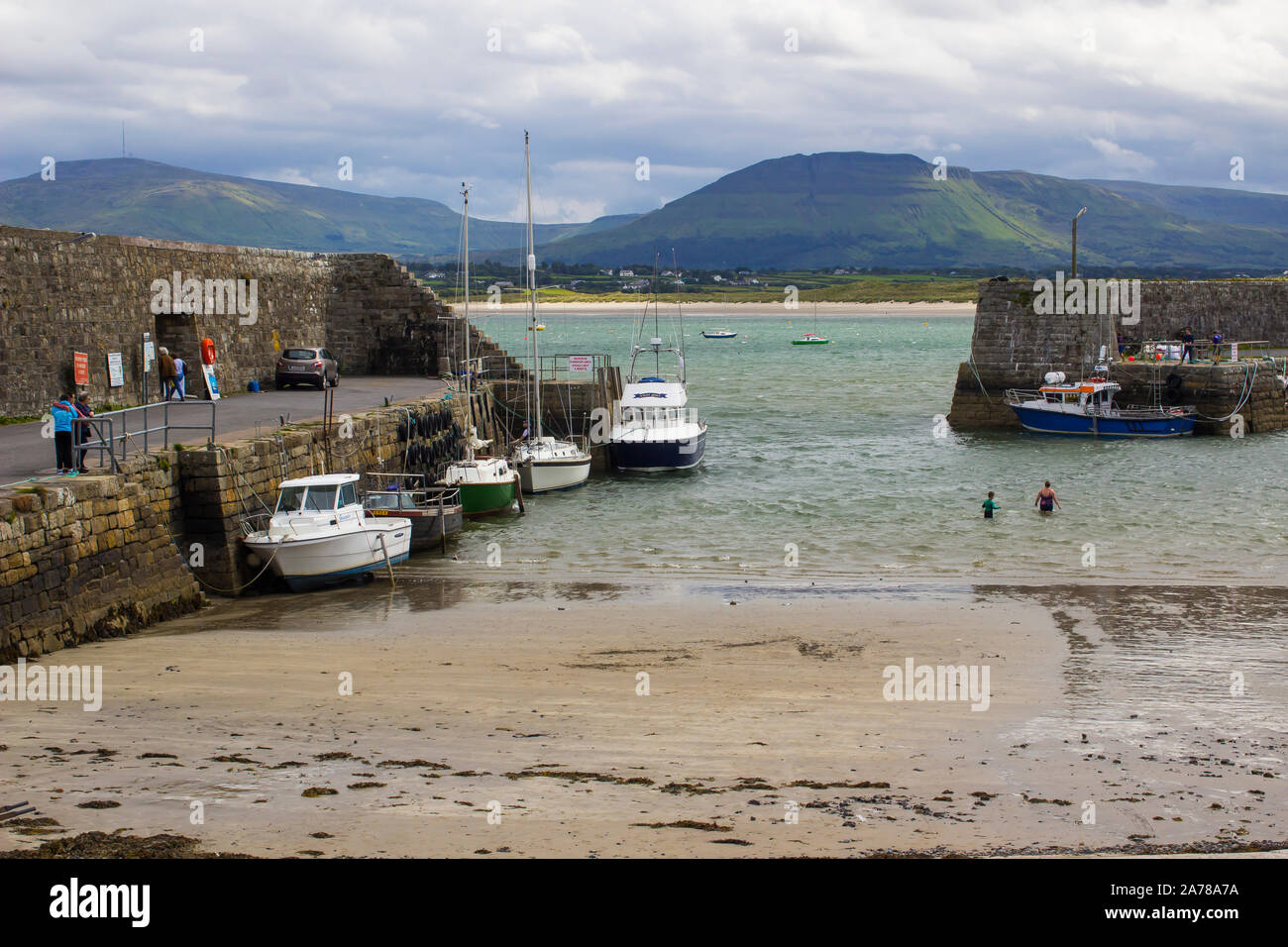 23 August 2019 Boats berthed in the classic stone harbour at ...