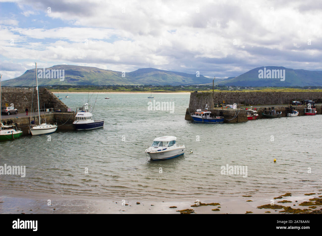 23 August 2019 Boats berthed in the classic stone harbour at ...