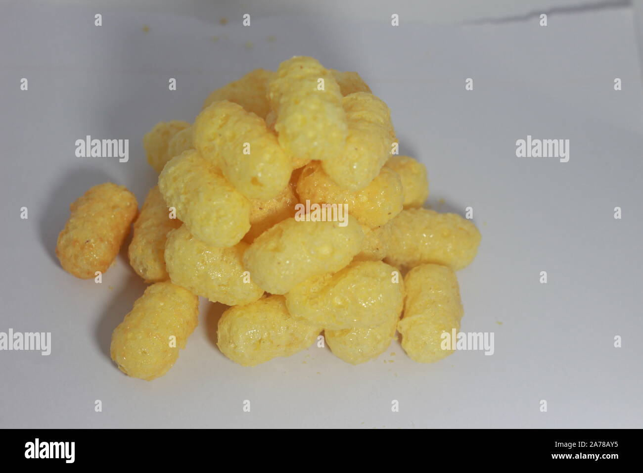 Cheese puff Cheese puffs white background texture food pattern Stock ...