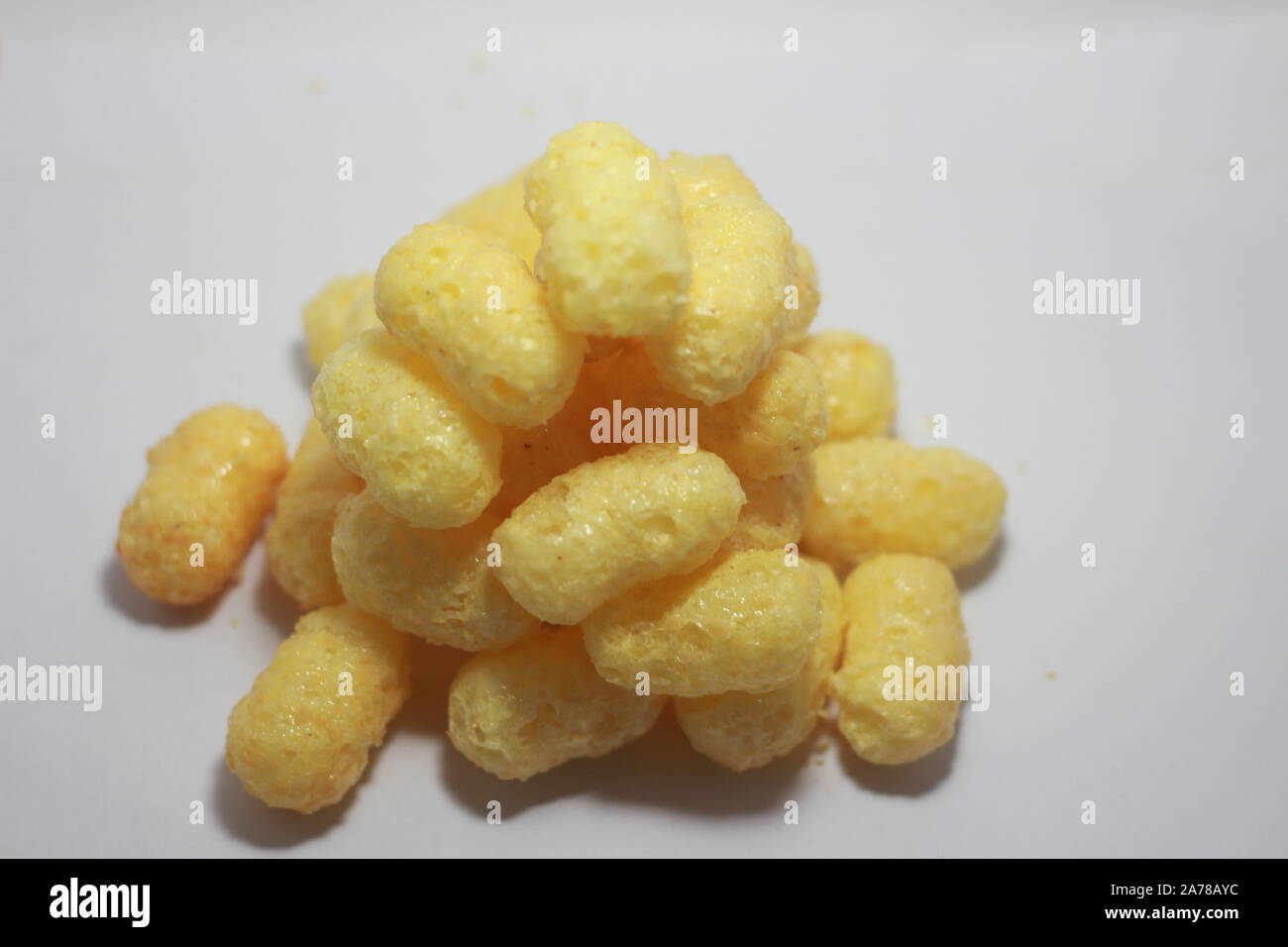Cheese puff Cheese puffs white background texture food pattern Stock ...