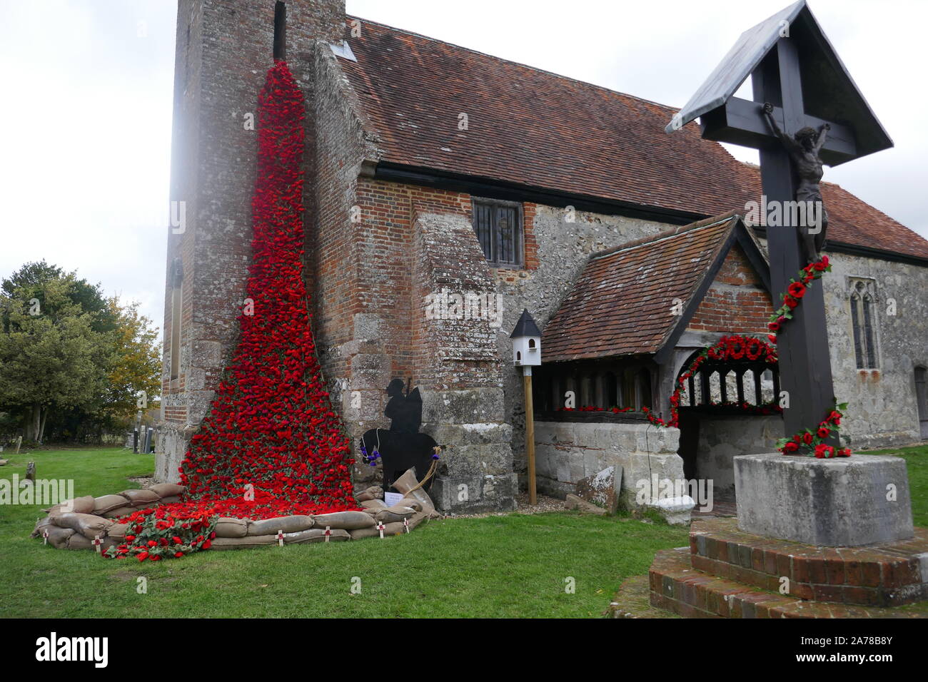 poppies hanging from church Stock Photo - Alamy