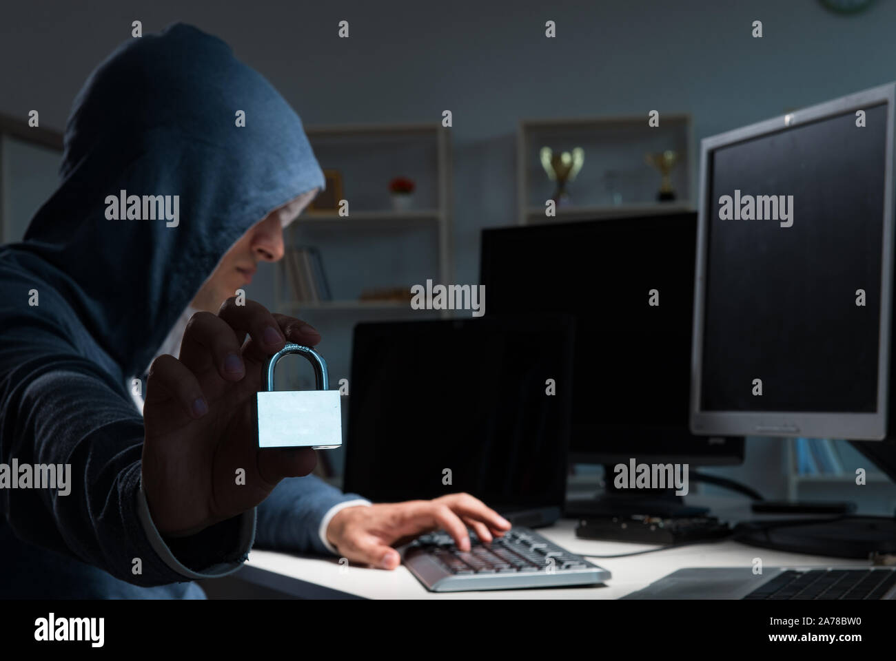 The hacker hacking computer at night Stock Photo - Alamy