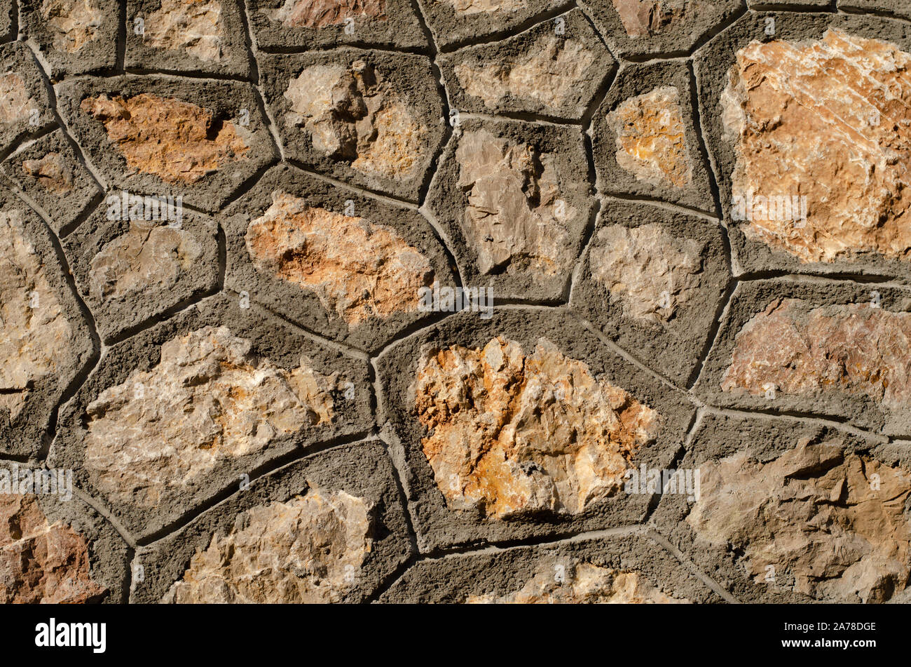 Building wall made from natural river stone and cement . Country rustic ...