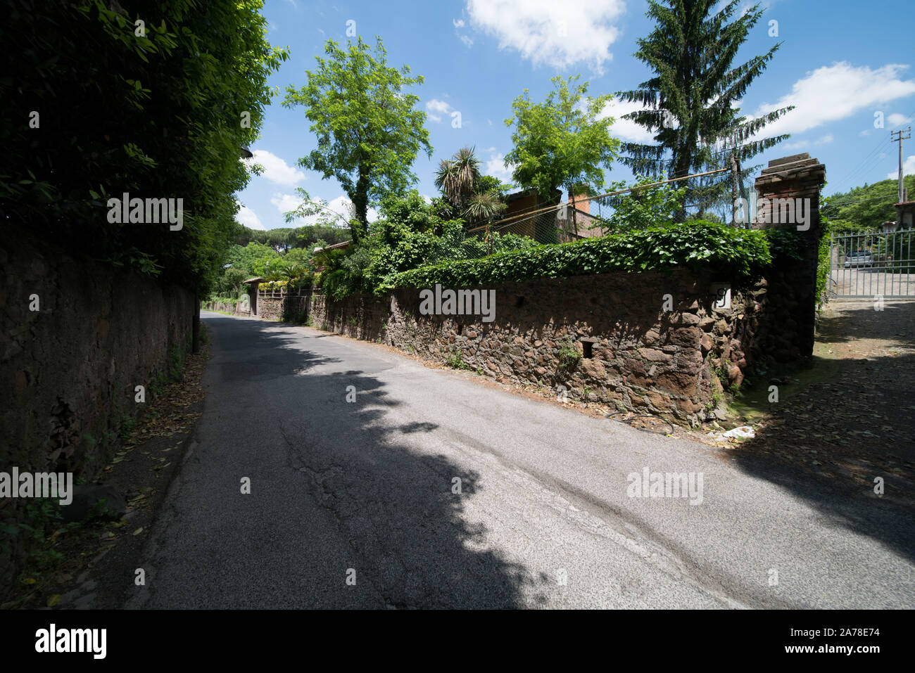 ancient Rome style street view with old stone walls Stock Photo - Alamy