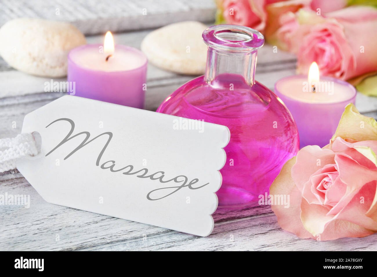 Massage Wellness flower decoration with label Stock Photo - Alamy