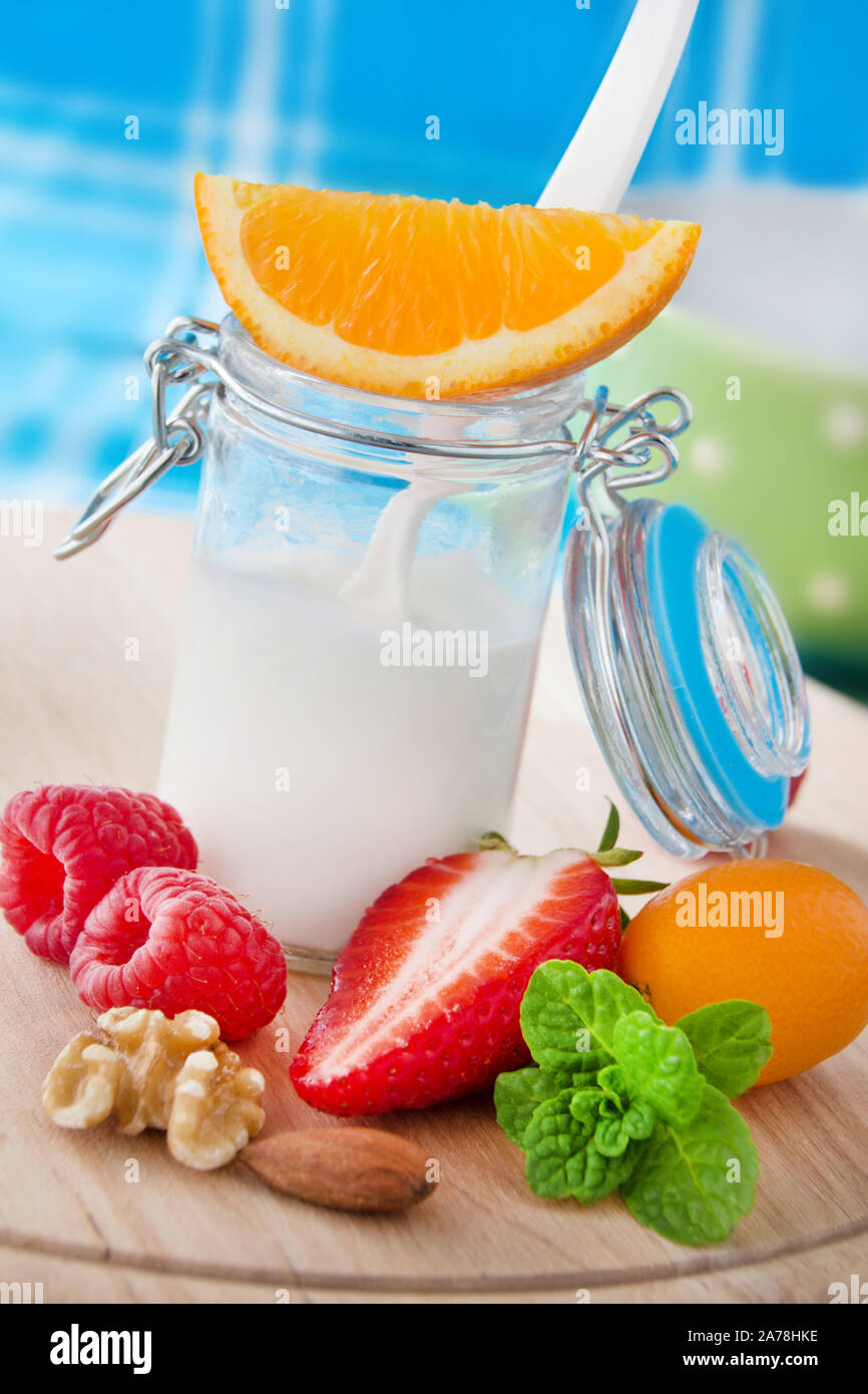 Yoghurt in glass with fruits Stock Photo - Alamy