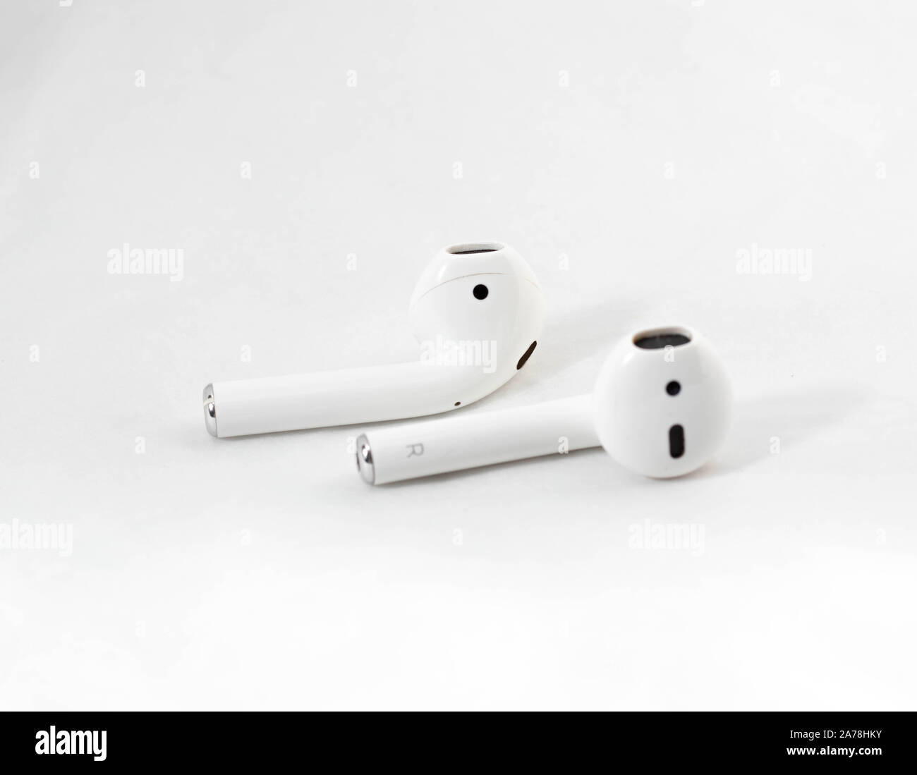 Air pods headphones hi-res stock photography and images - Alamy