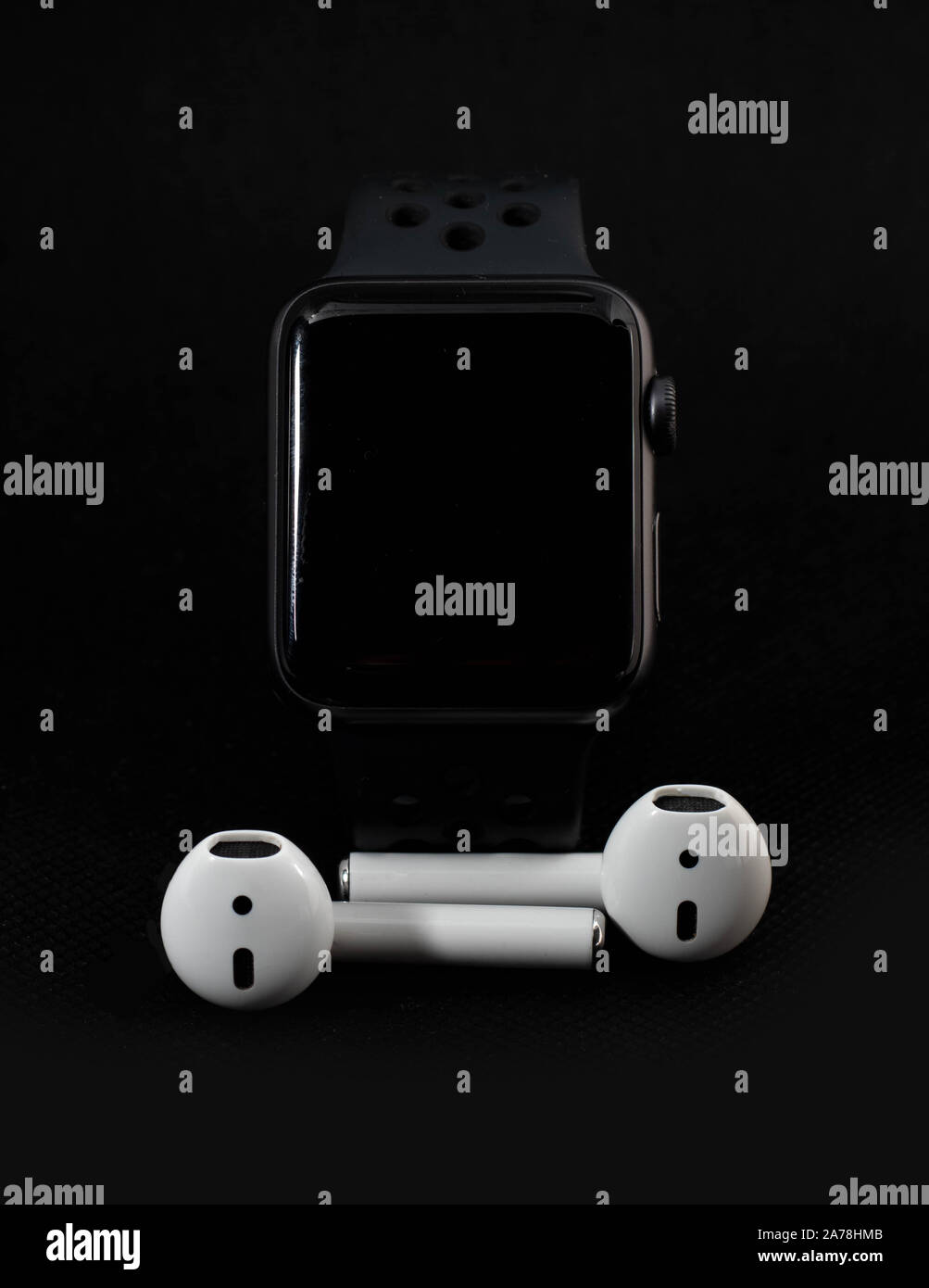 close up image of the apple watch and apple air pods 2 Stock Photo - Alamy
