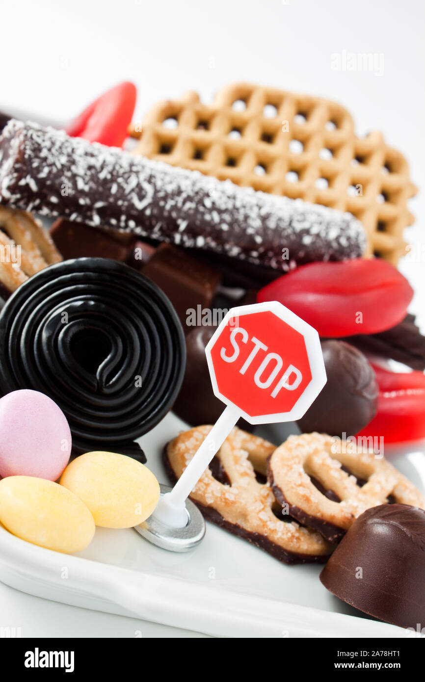 Diet and sweets with stop sign concept Stock Photo - Alamy
