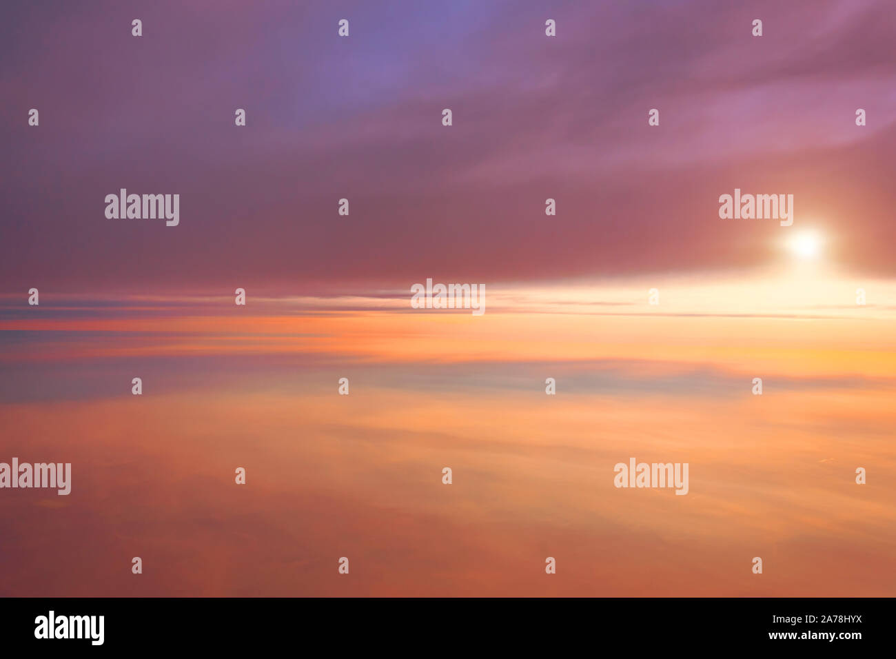 Amazing view from plane between different layers of clouds on the sky ...