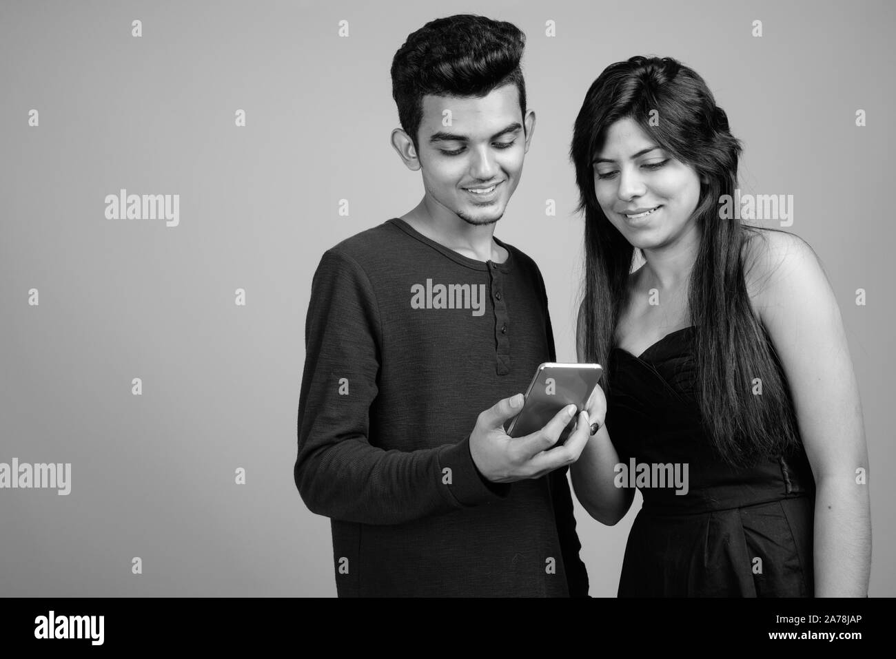 Young Indian man and young Indian woman together Stock Photo - Alamy